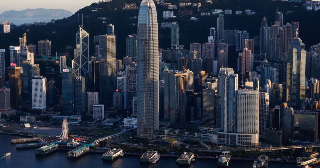 Hong Kong-listed shares of AIA, HSBC and StanChart fall as China ...